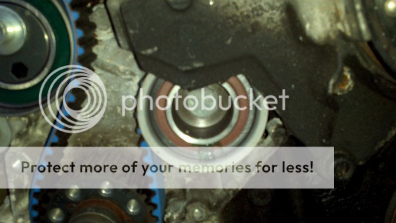 Brand new timing belt idler roller/pulley leaking grease (with picture)